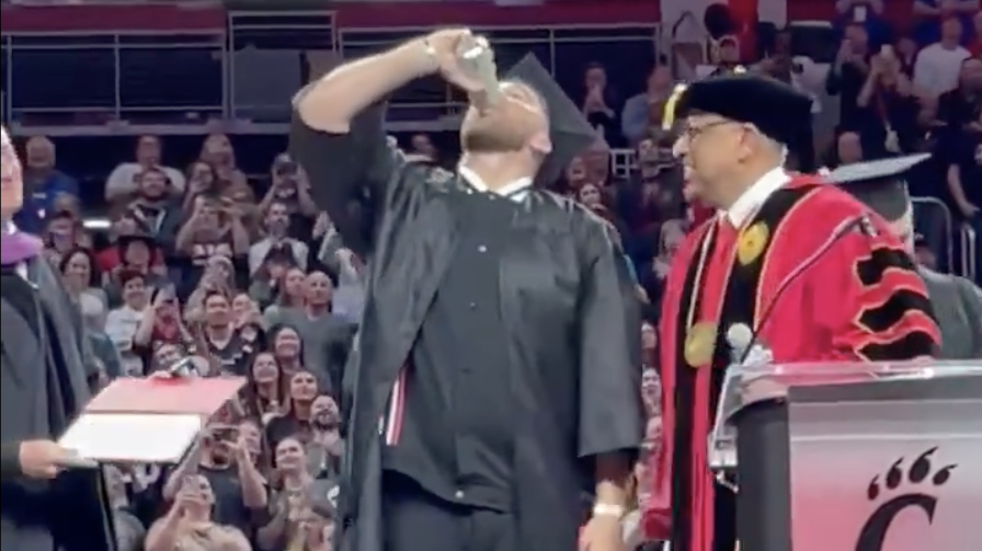 Travis Kelce Chugs Beer During Graduation Ceremony