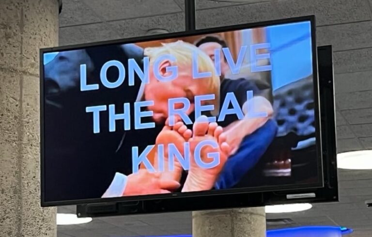 Feds ID Hacker Behind Trump-Musk Foot-Kissing AI Video